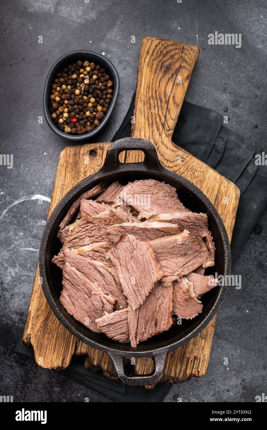 Cooked Boiled lamb meat in a skillet. black background. top view Stock ...