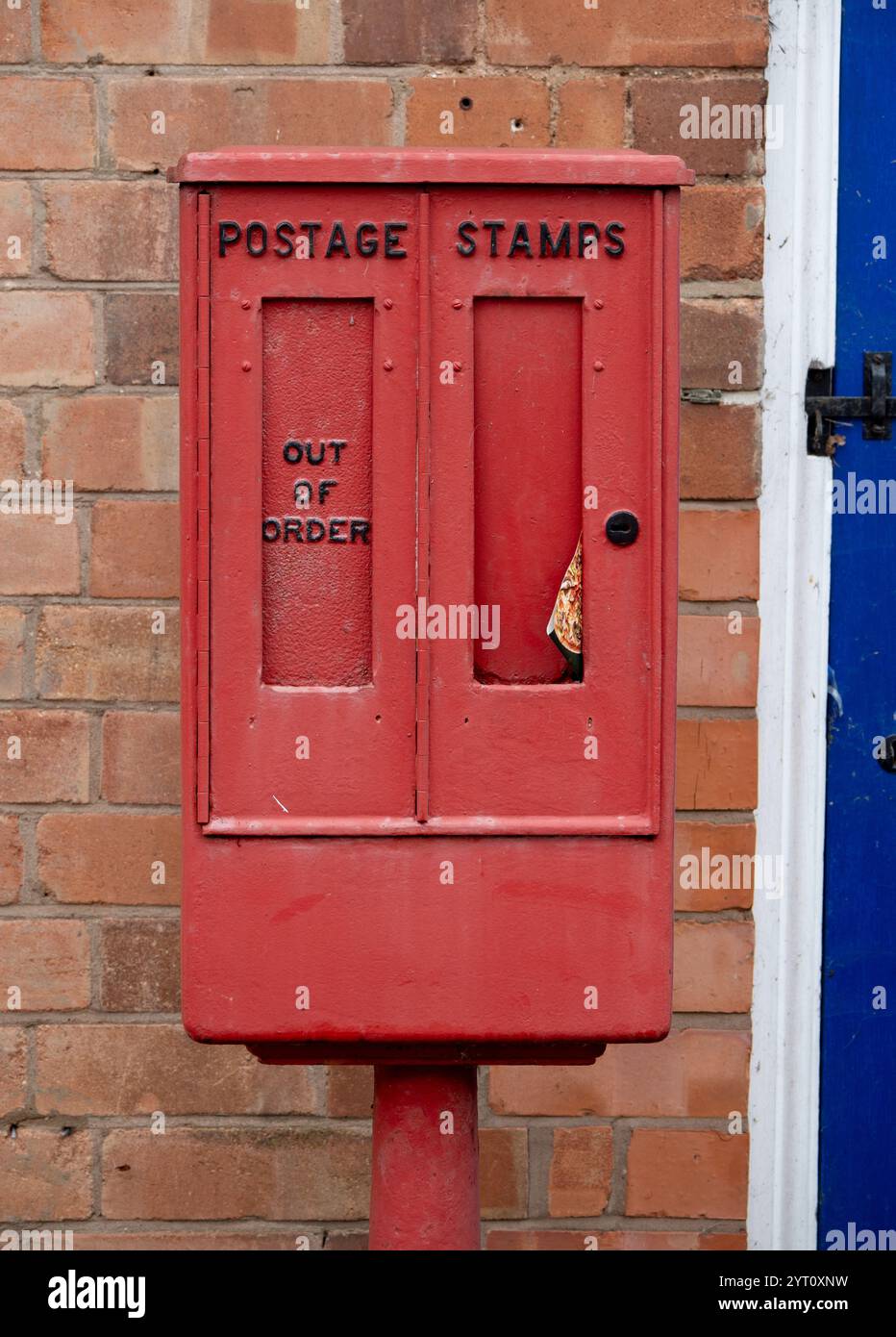 Old postage stamp machine, Shottery, Warwickshire, England, UK Stock ...