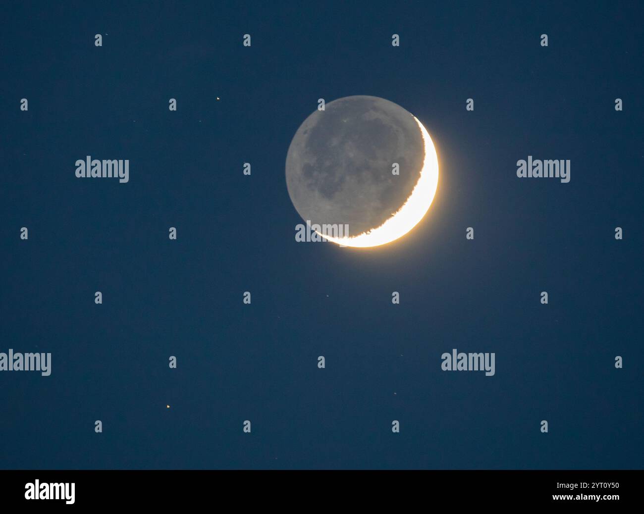 Crescent moon with earthshine hi-res stock photography and images - Alamy