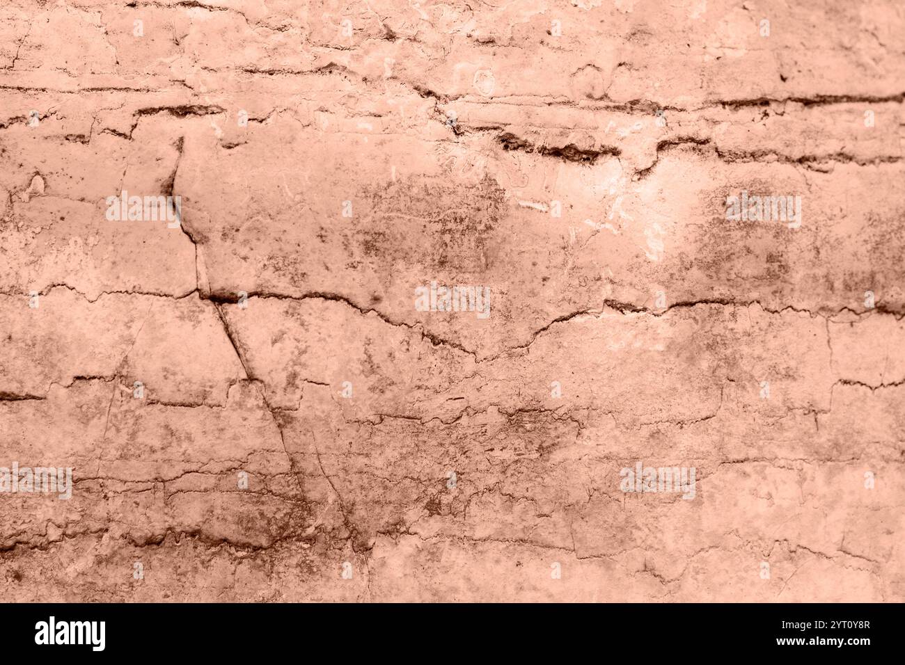 Closeup of a cracked stone wall with a brown brick pattern. Texture ...