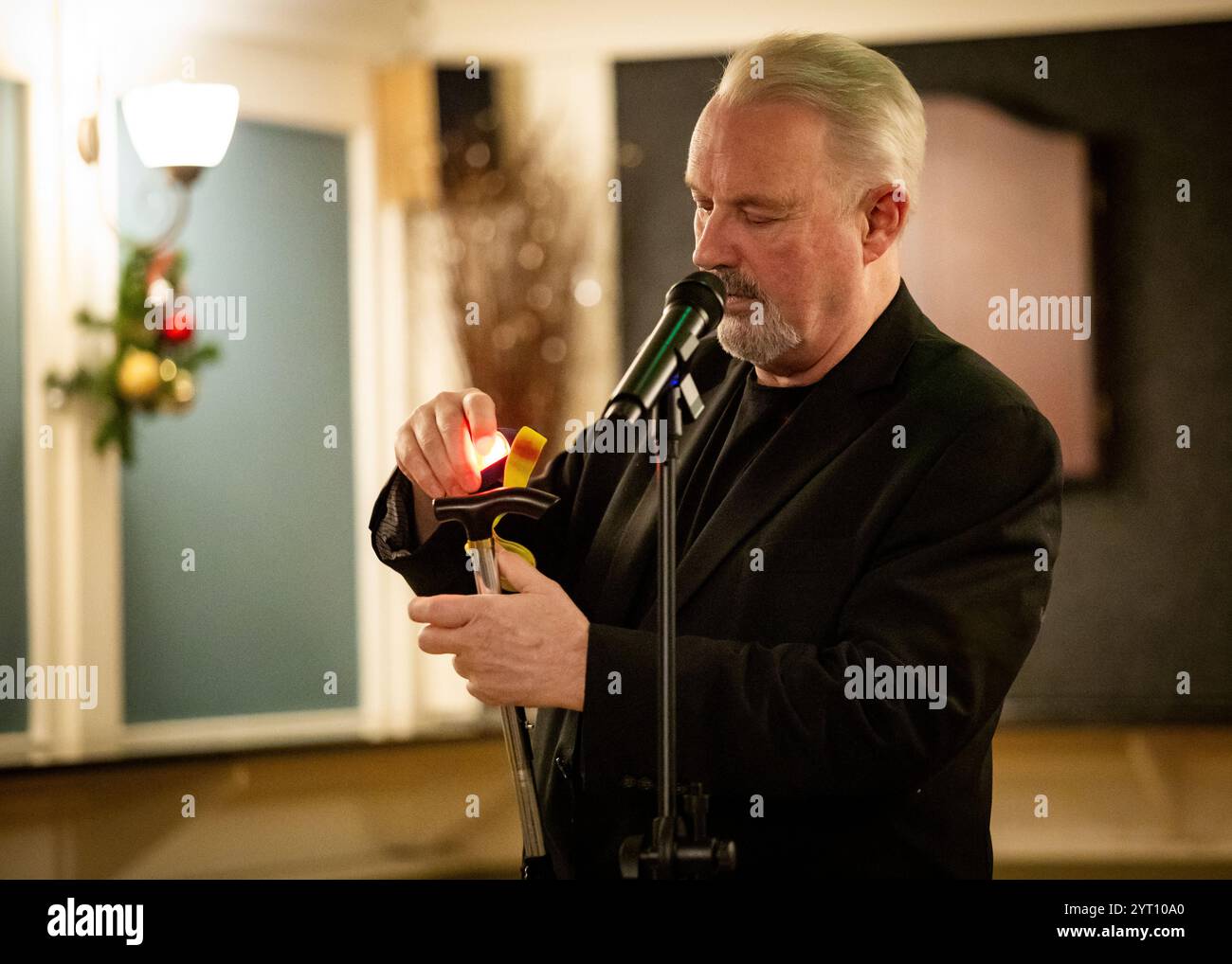 John Lenahan performing at the Cancer Research UK City of London ...