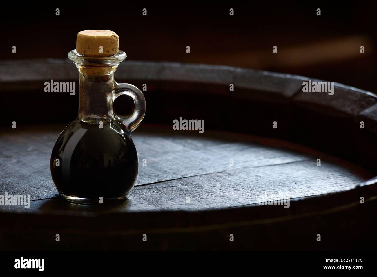 Small bottle of balsamic vinegar of Modena on a wooden barrel Stock ...
