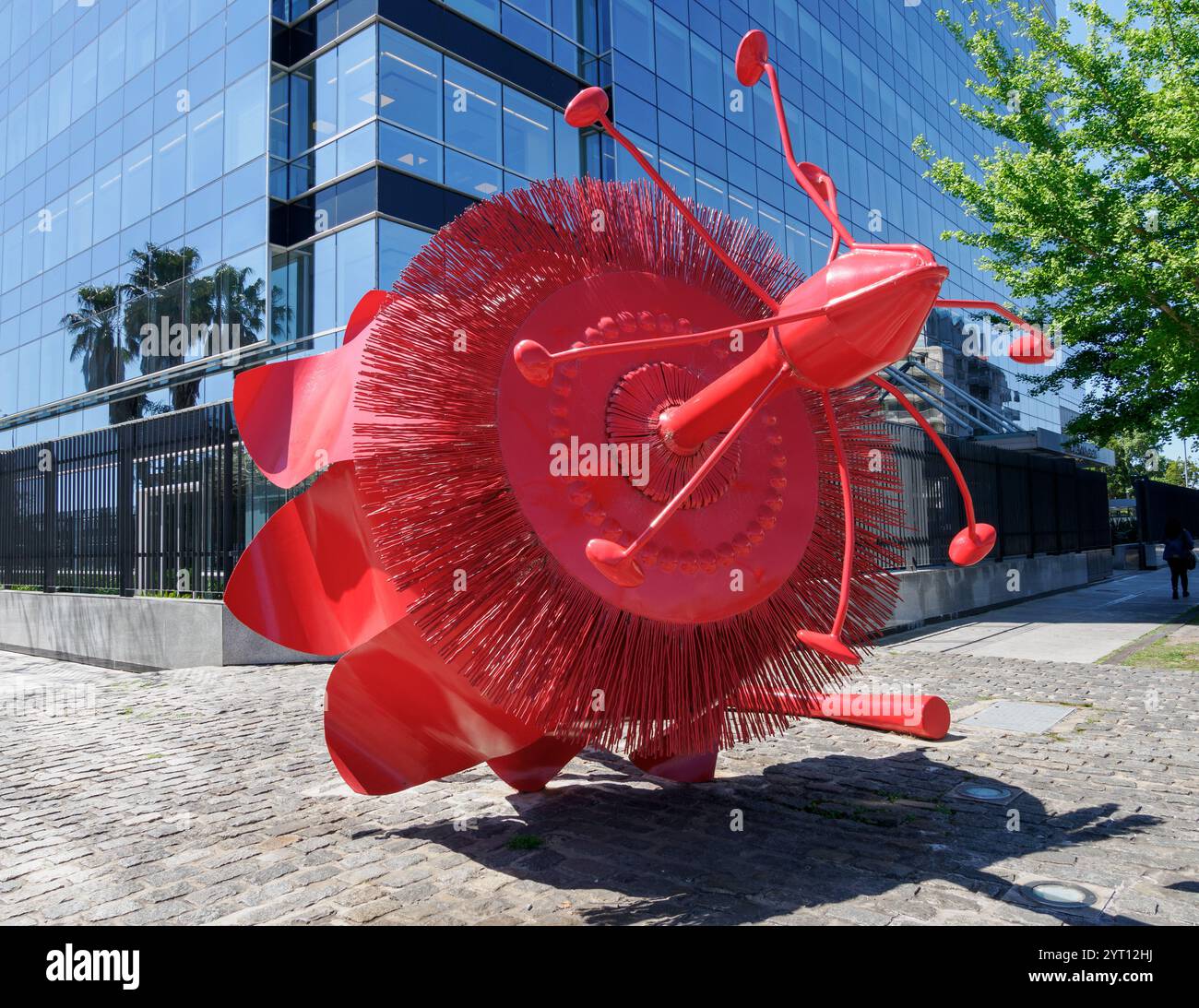 Giant red metal Passion Flower sculpture by Marcela Cabutti on the ...