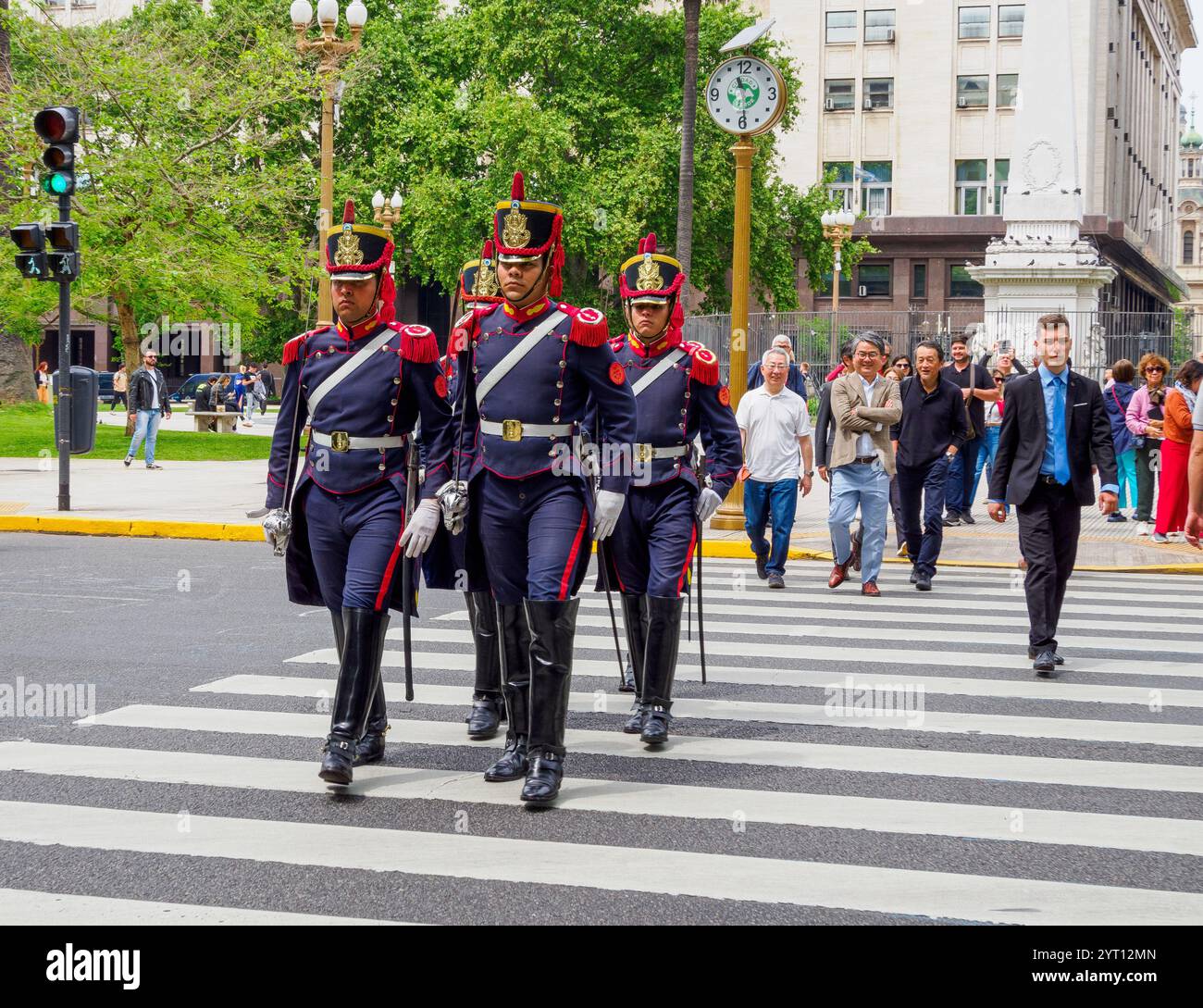 Soldiers of the Palace Guard on a zebra crossing in Playa de Mayo on ...