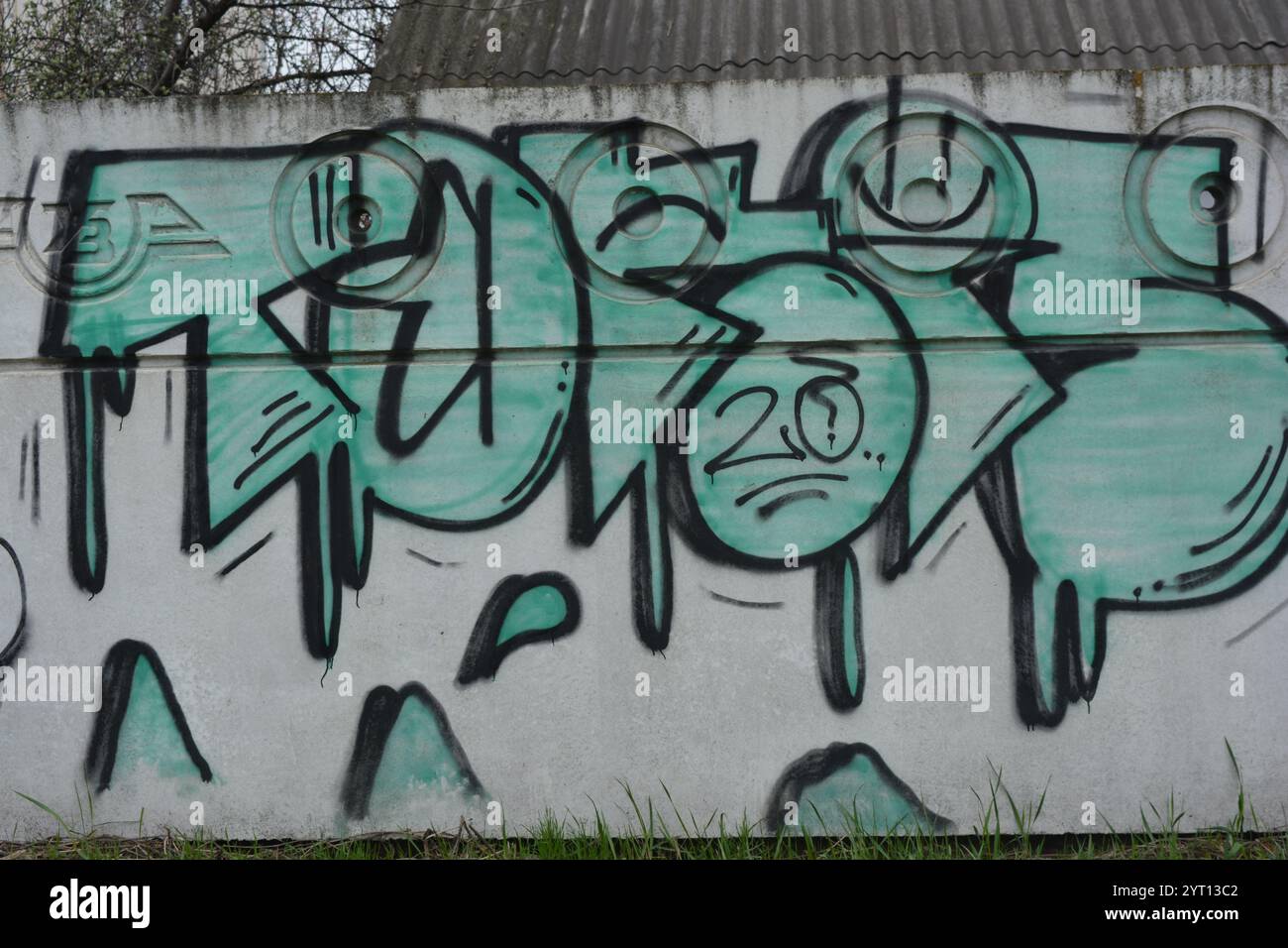 Gray-green letters, green and black lines, and long black drops. A ...