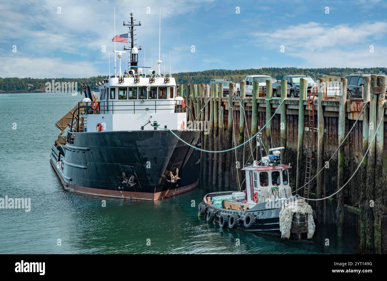 High Dock at Low Tide: A New England dock offers a ladder to occupants ...