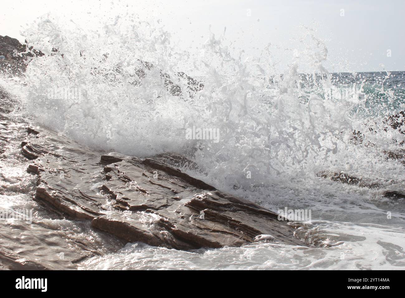 Waves spilling over rocks hi-res stock photography and images - Alamy