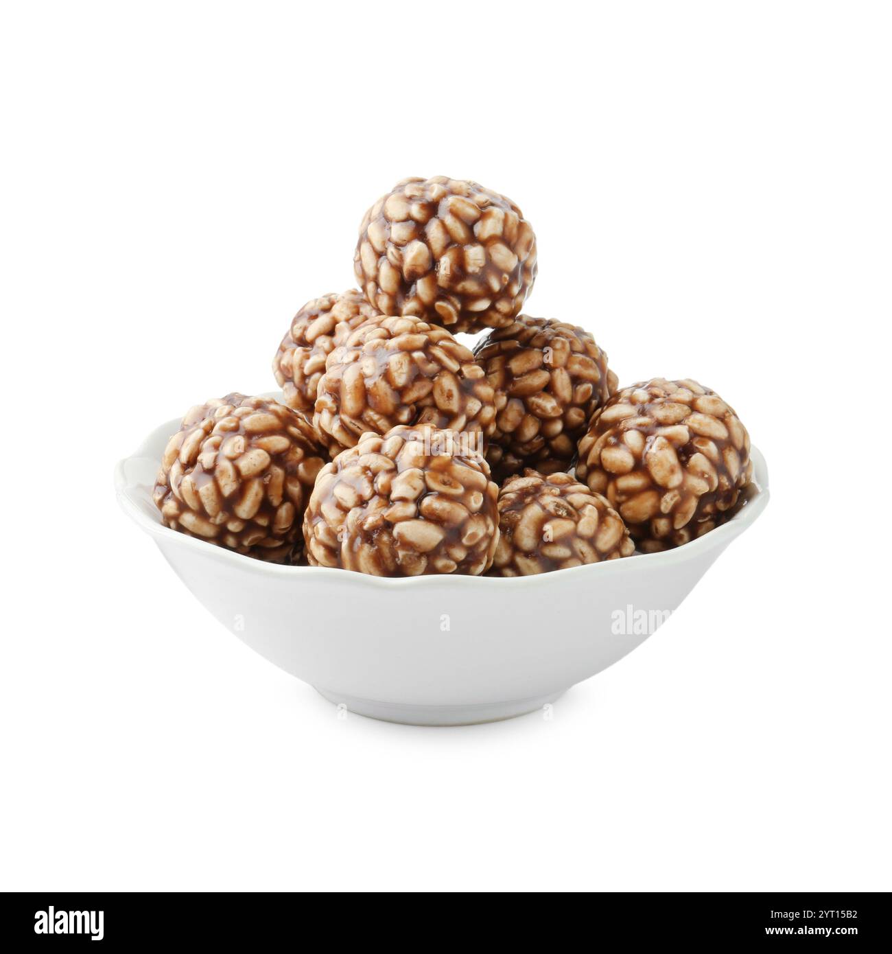 Delicious chocolate puffed rice balls in bowl isolated on white Stock ...
