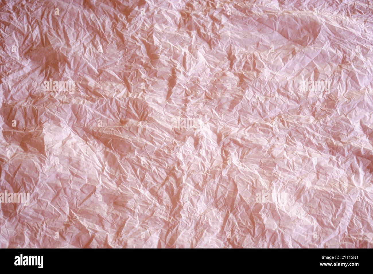 light pink background with crumpled tissue paper texture Stock Photo ...