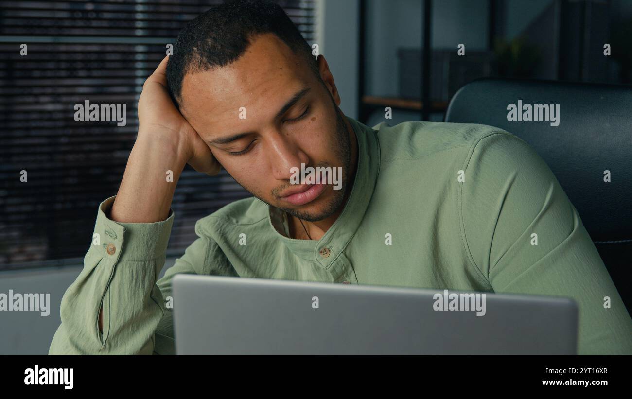 Tired businessman laptop falling asleep hi-res stock photography and ...