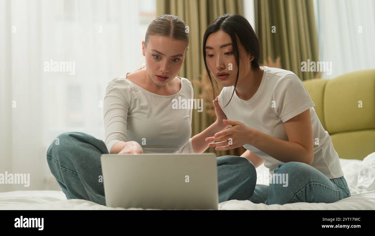 Two multiracial women upset frustrated sad worried friends female ...