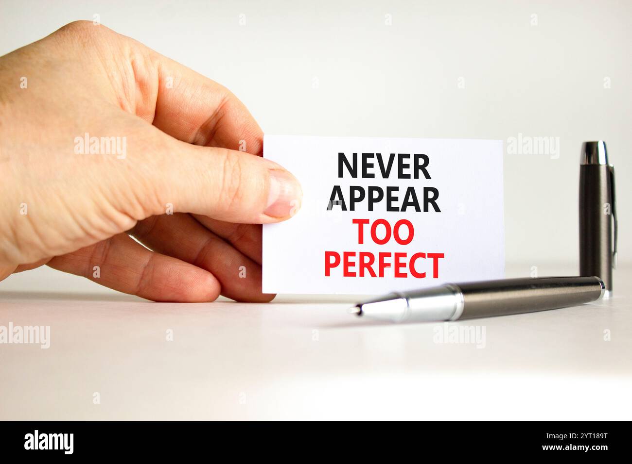 Never appear too perfect symbol. Concept words Never appear too perfect ...