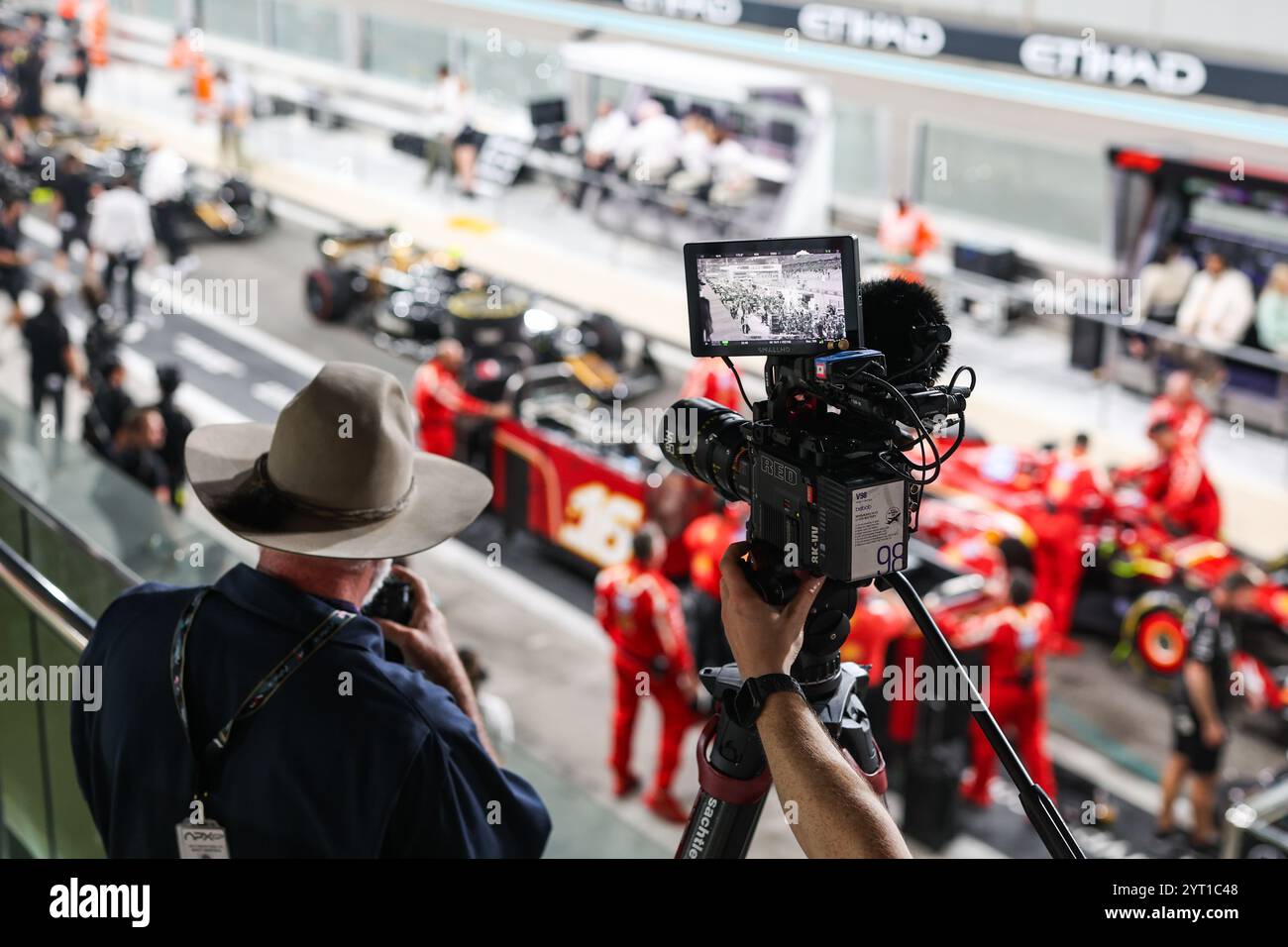 APX GP Team crew filming in the paddock for the Apex F1 movie by Apple ...