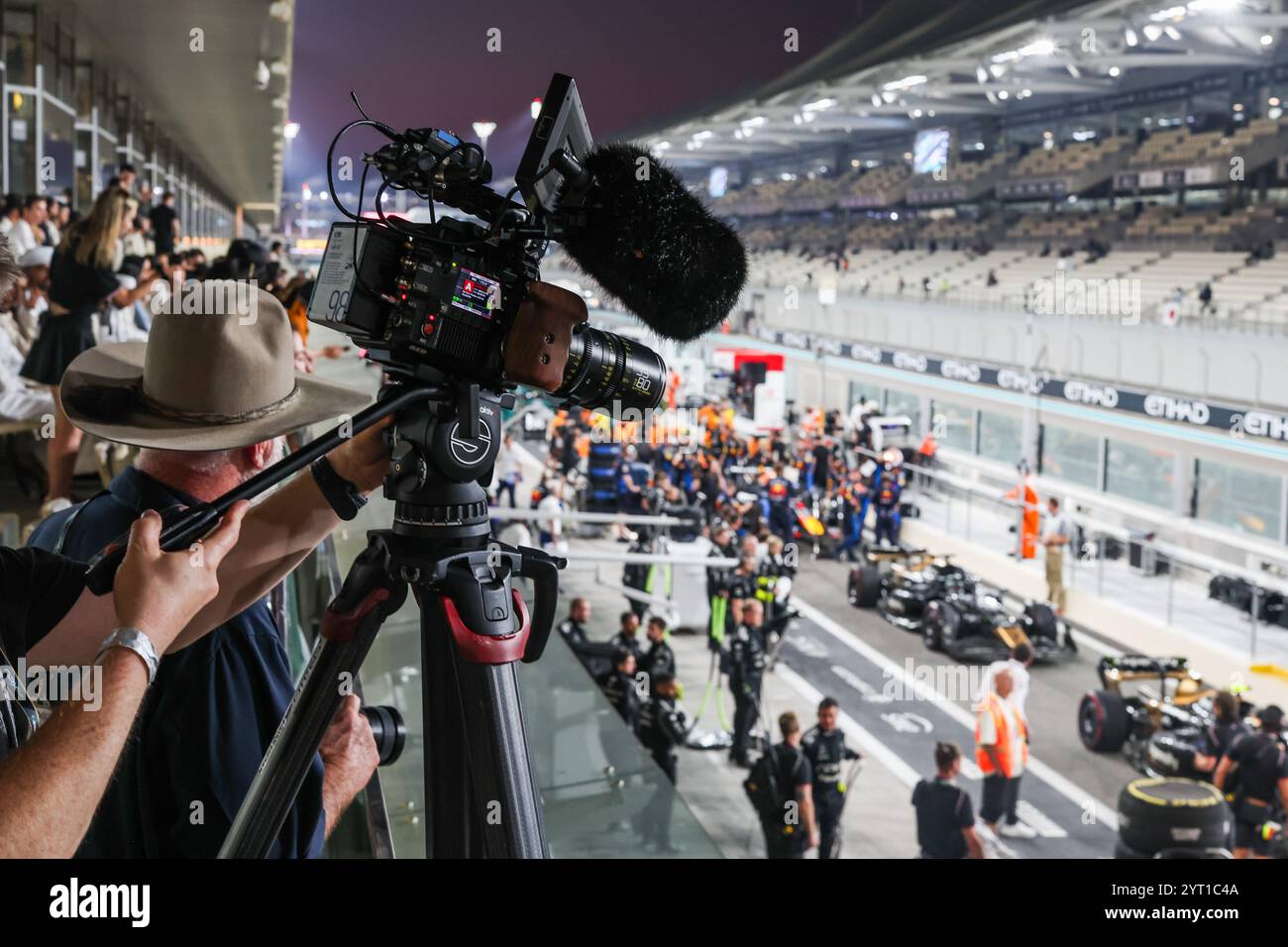 APX GP Team crew filming in the paddock for the Apex F1 movie by Apple ...