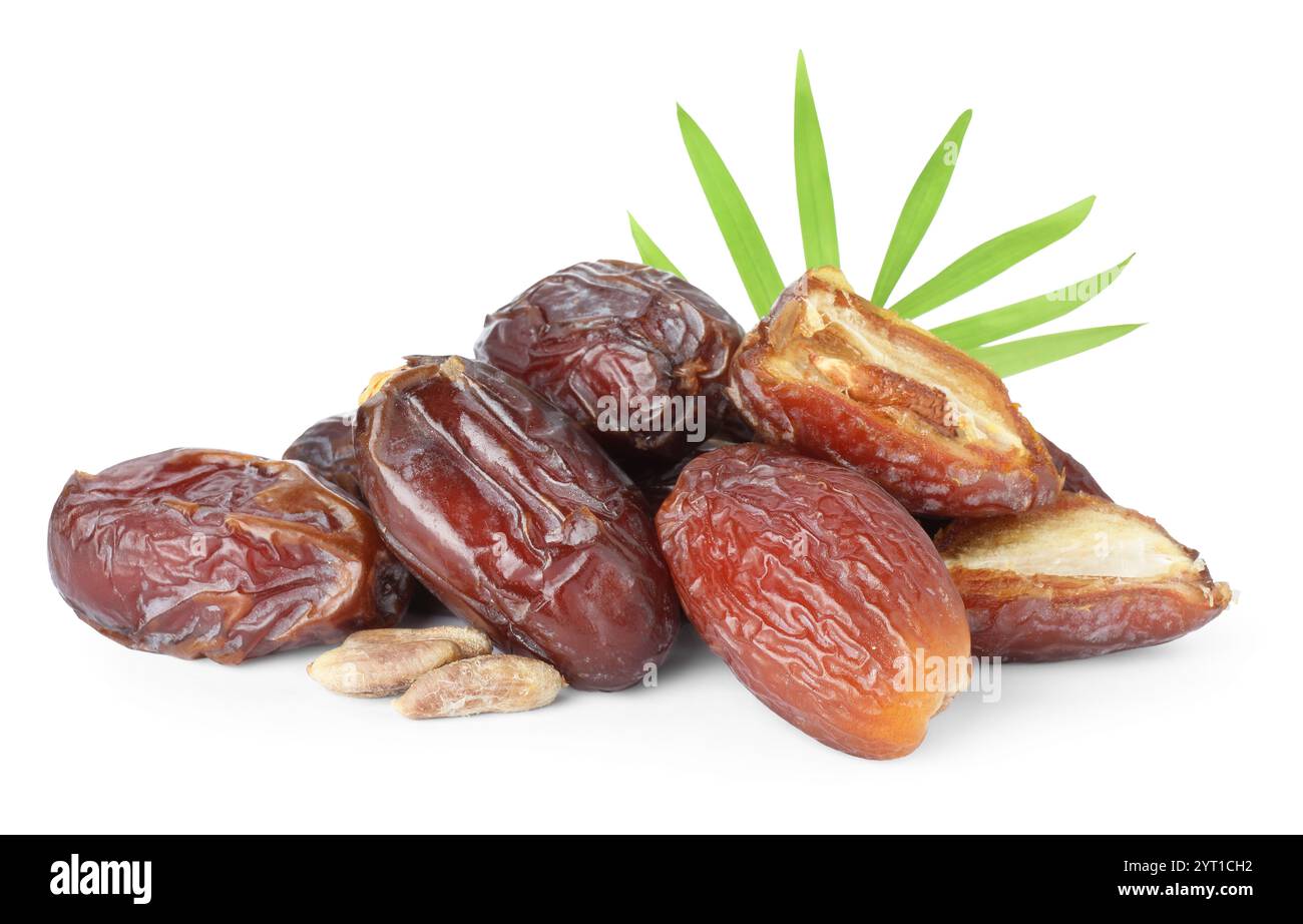 Tasty dried dates, seeds and leaf isolated on white Stock Photo - Alamy