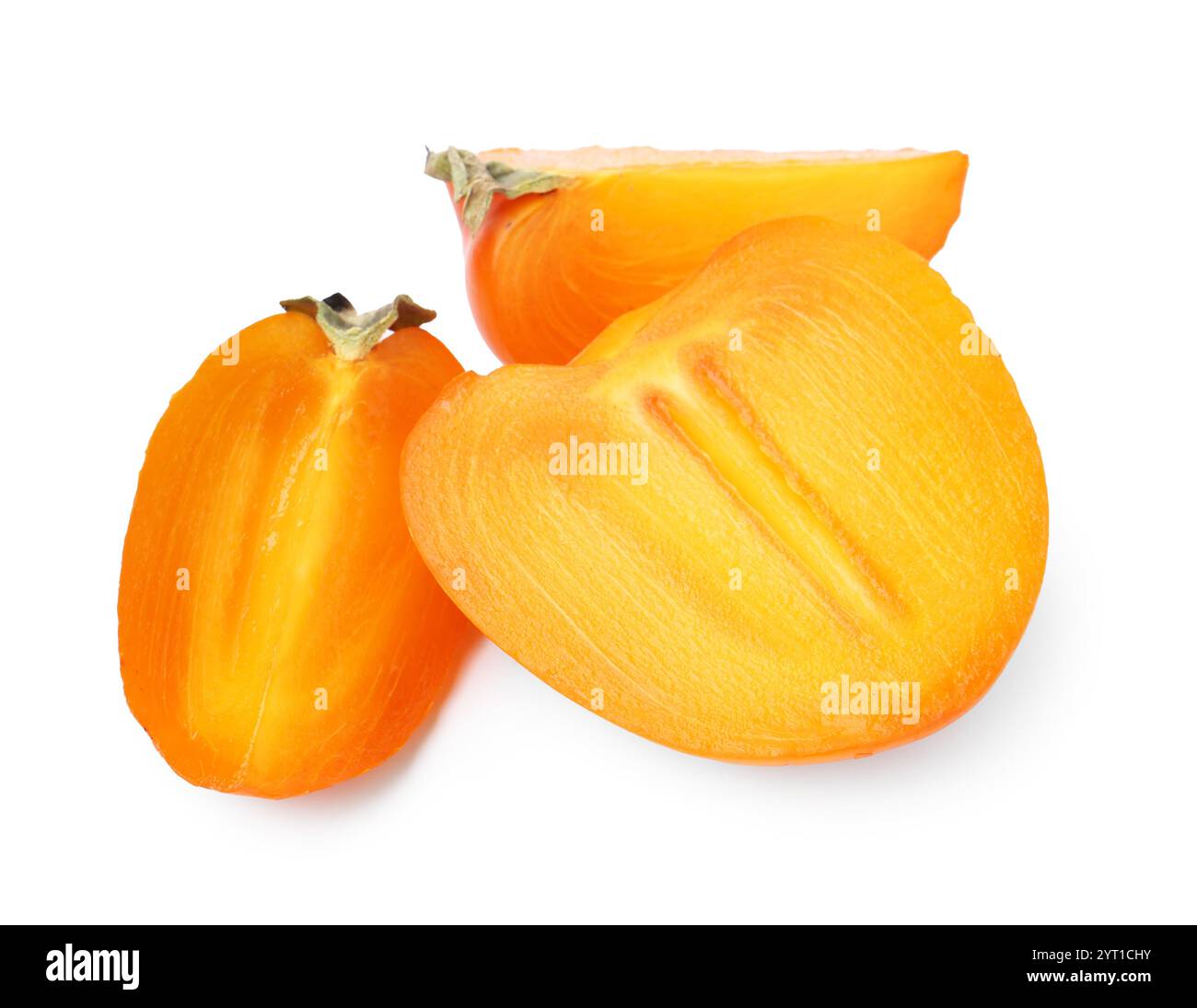 Pieces of ripe persimmon isolated on white Stock Photo - Alamy