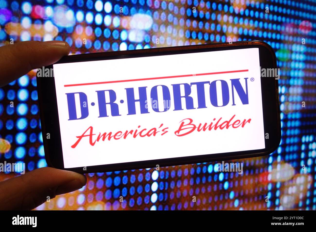 In this photo illustration, the D.R. Horton company logo is seen ...