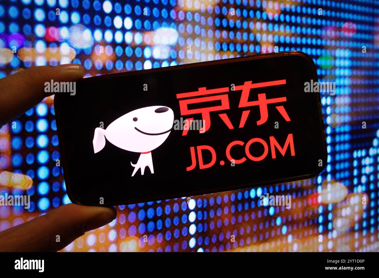 In this photo illustration, the Jingdong Mall company logo is seen ...