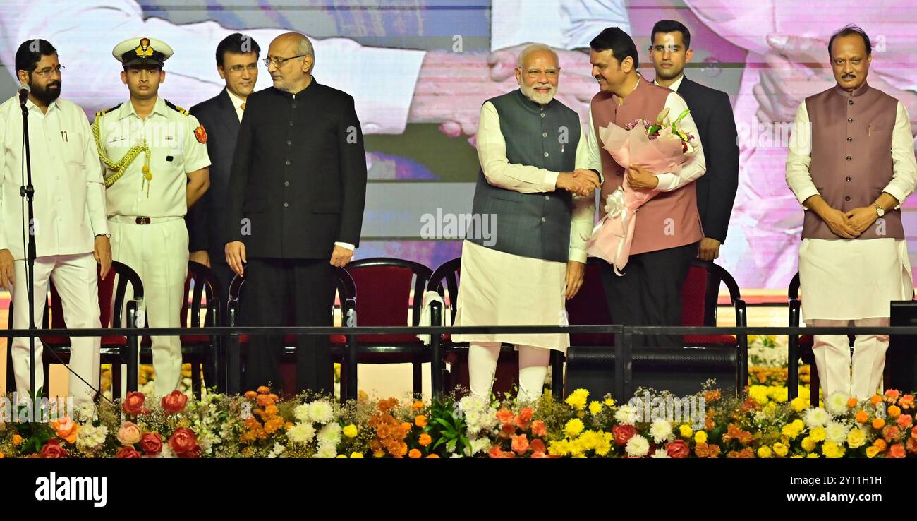 MUMBAI, INDIA - DECEMBER 5: PM Narendra Modi shares light moment with newly appointed CM ...