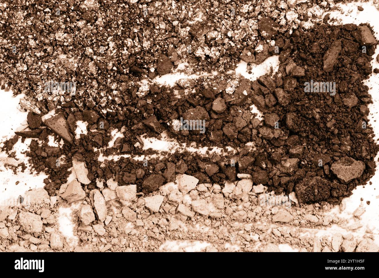 Earthy texture with various soil tones and rugged rocky formations ...