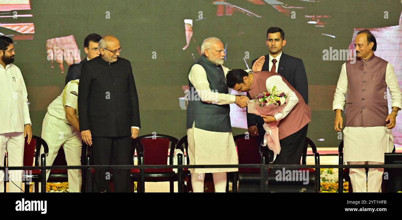 MUMBAI, INDIA - DECEMBER 5: PM Narendra Modi shares light moment with newly appointed CM ...
