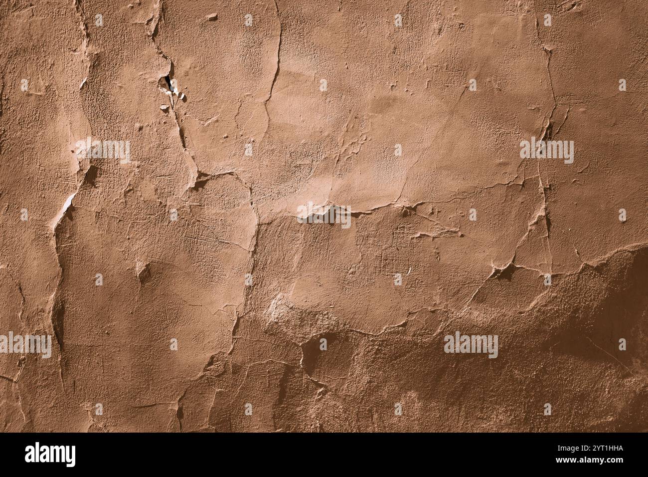 Textured brown cracked wall surface in earthy Mocha and Mousse tone ...