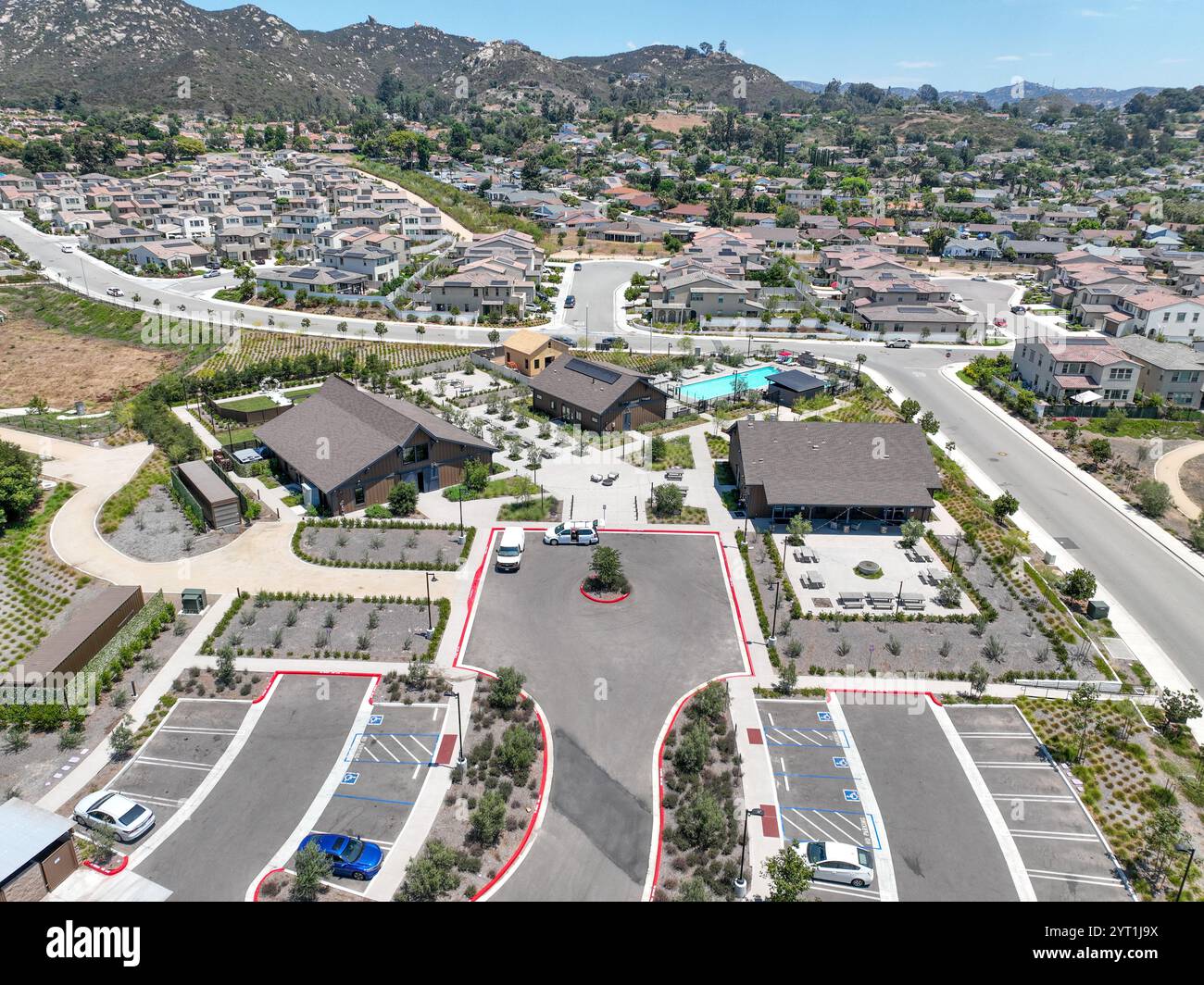 Aerial video of recreational facilities with pool in private ...