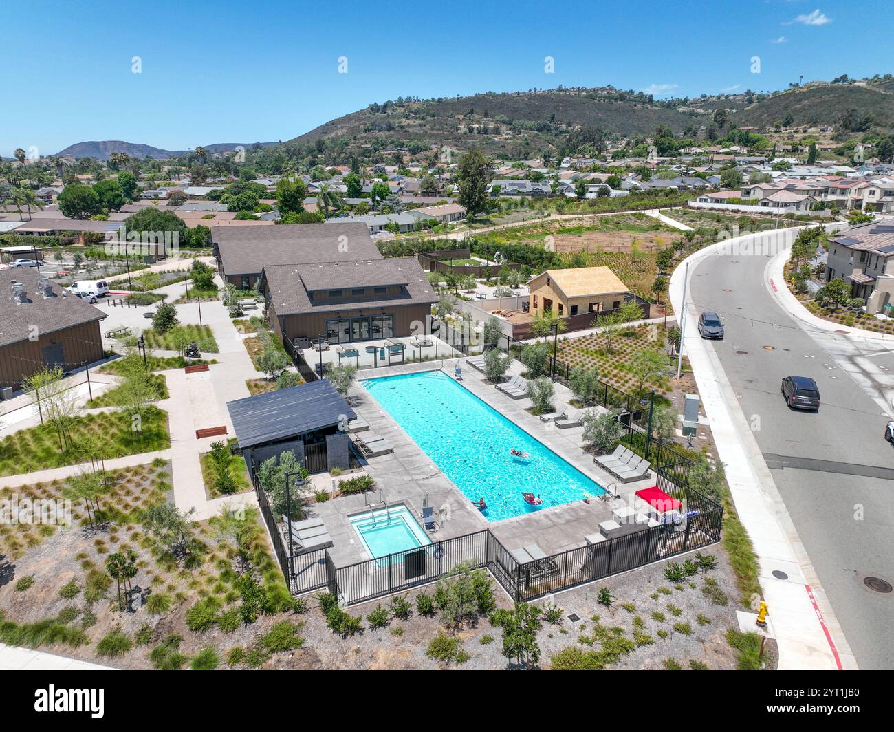 Aerial video of recreational facilities with pool in private ...