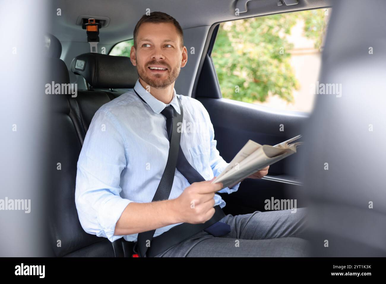Newspaper car driving hi-res stock photography and images - Alamy