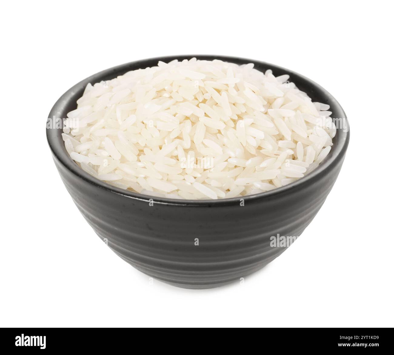 Raw rice in bowl isolated on white Stock Photo - Alamy