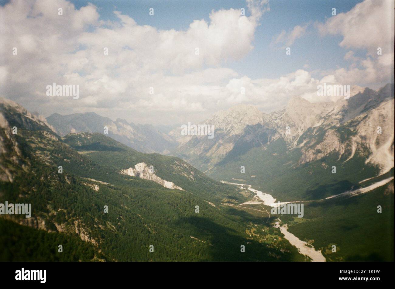 Scenic mountain on the Peaks of the Balkans trail with a green valley ...