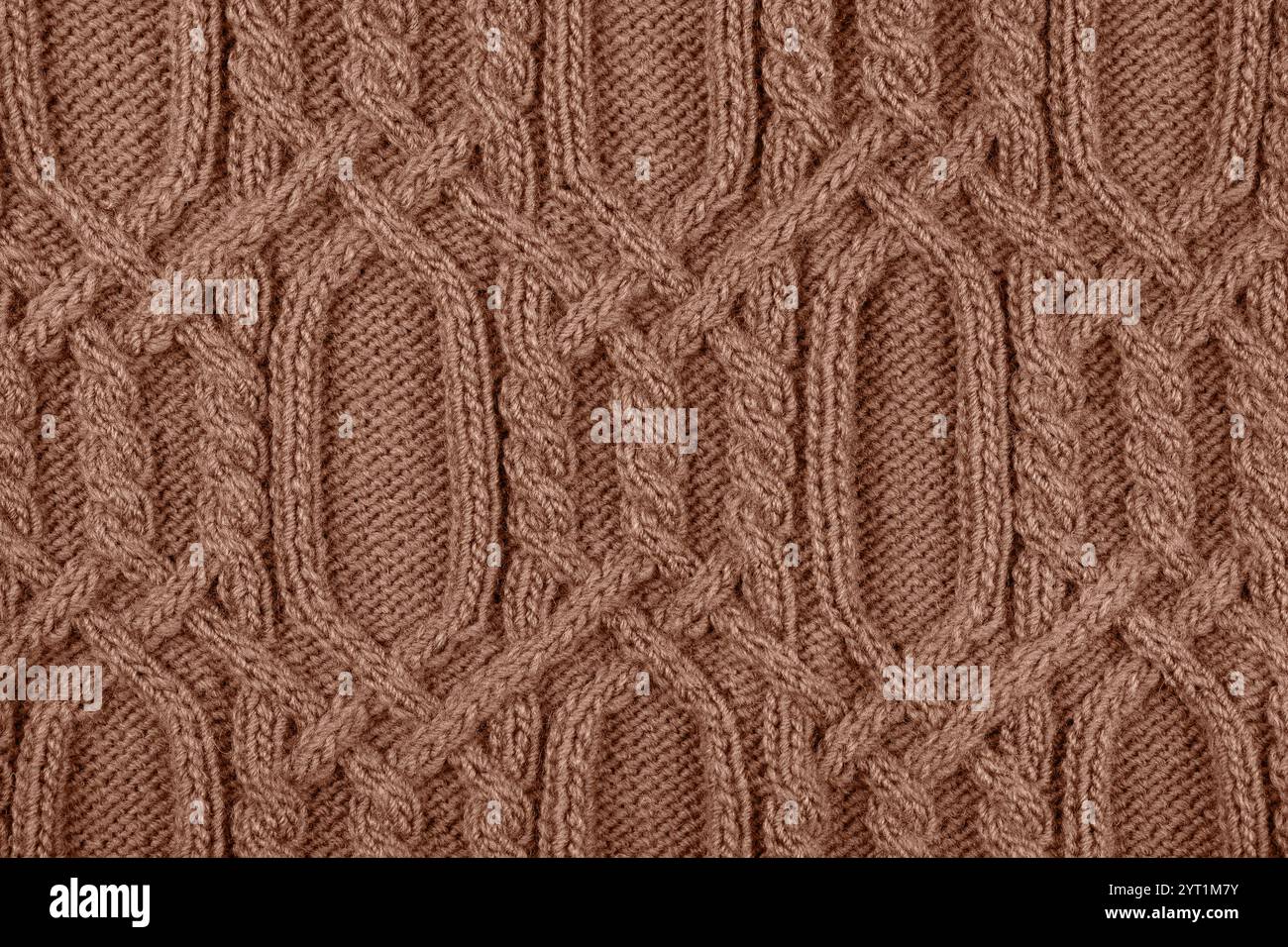 Demonstrating the colors of 2025 - Mocha Mousse. Knitted brown ...