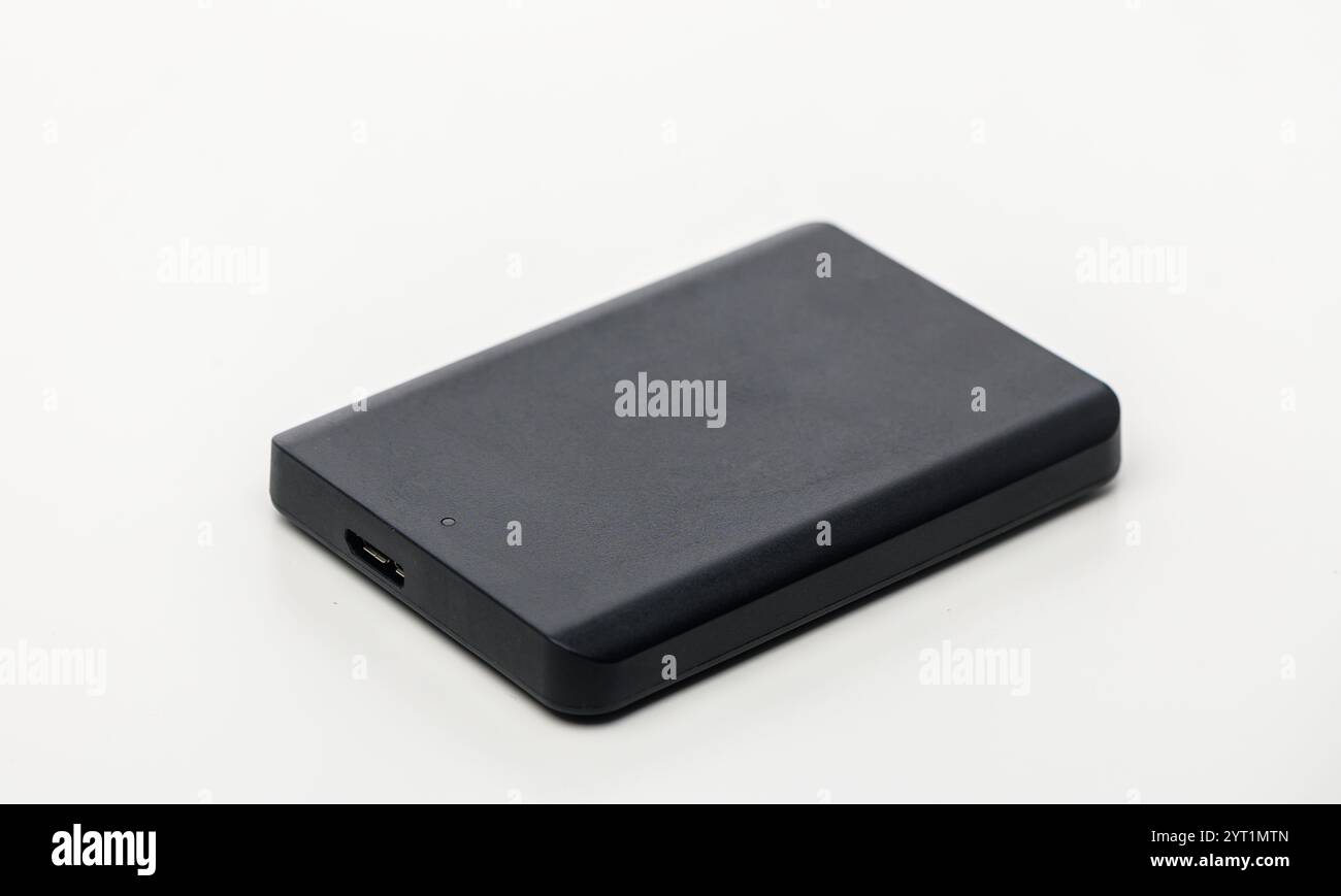 Sleek black gadget on a white background, ideal for charging devices in ...