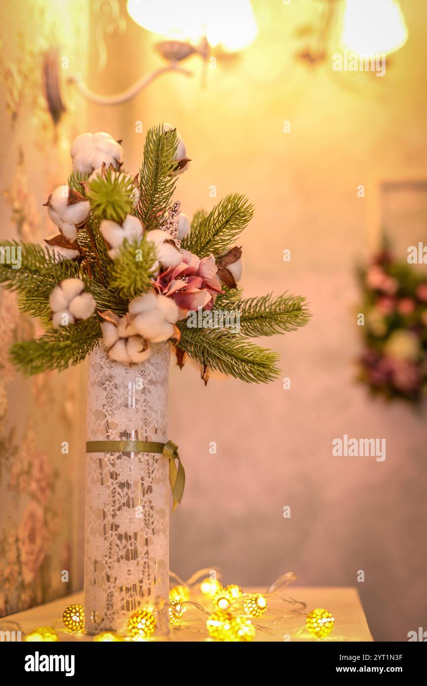 The image shows a bouquet of cotton and fir branches Stock Photo - Alamy