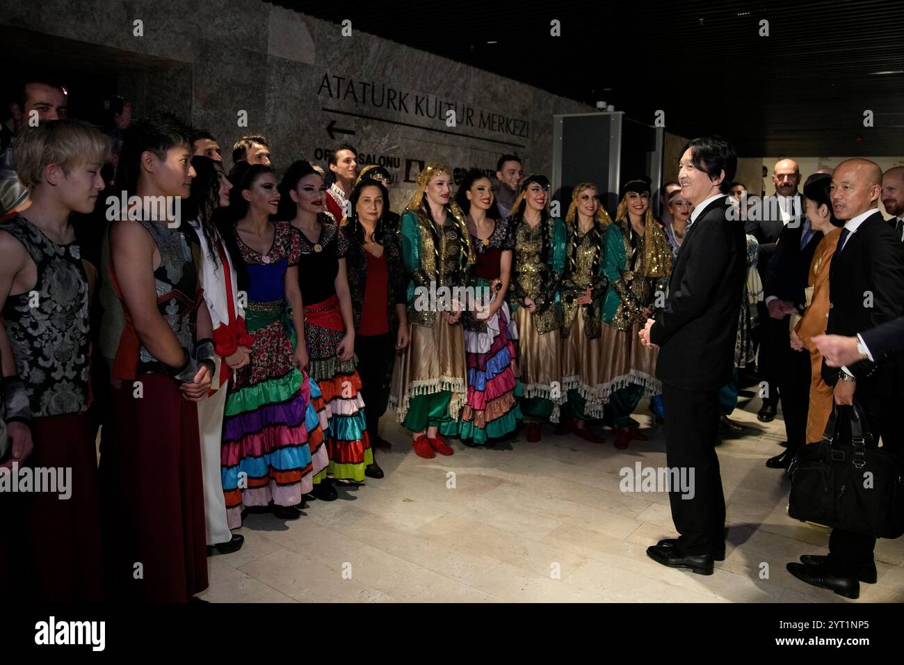 Japan's Crown Prince Akishino, right, greets performers at the end of a ...