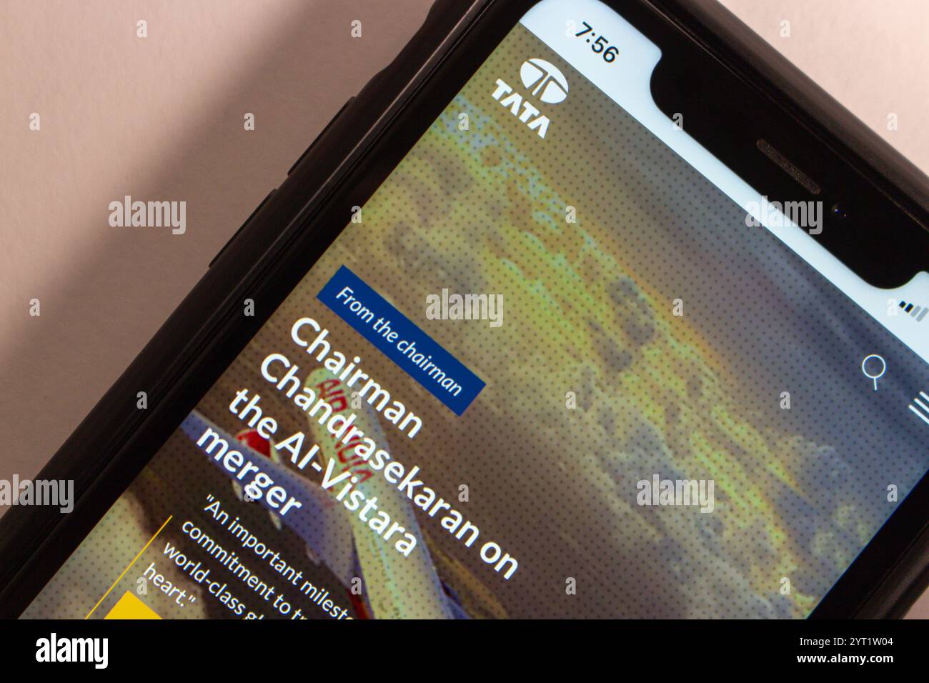 Website of Tata Group is displayed on an iPhone. Tata is an Indian ...