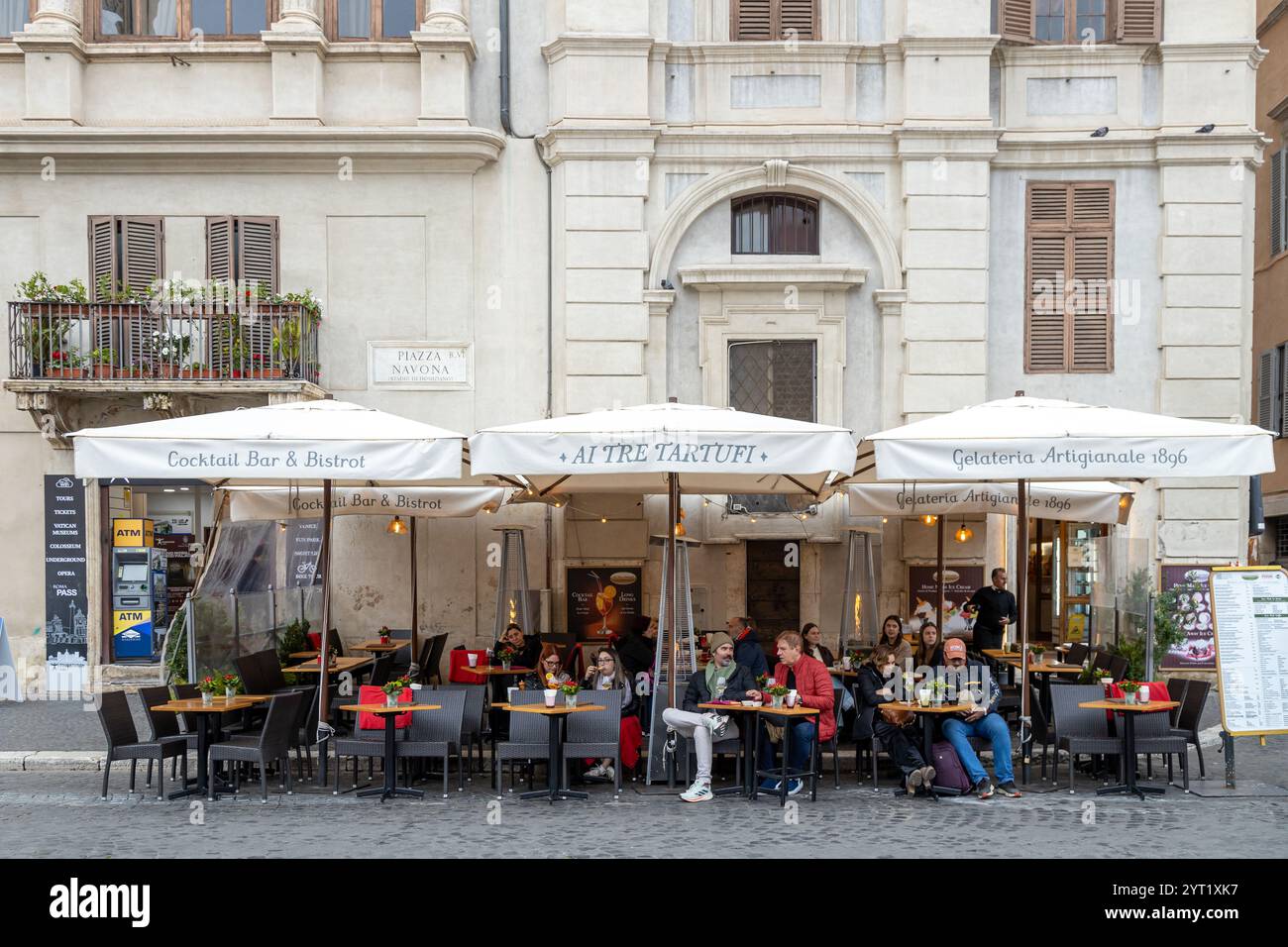 Rome, Italy - Nov 14th, 2024: People enjoying outdoor seating at a ...