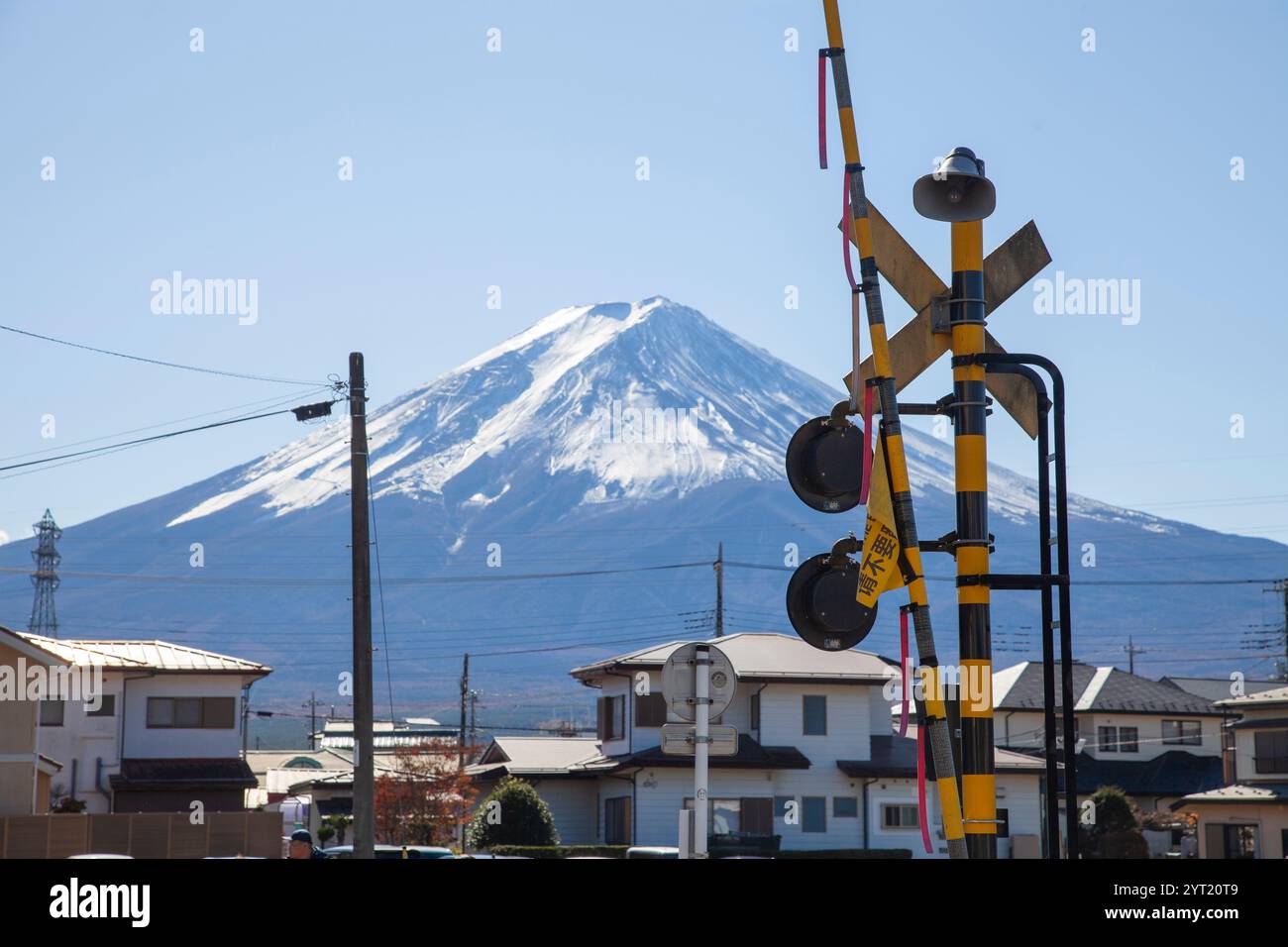 Small road and train crossing near Kawaguchiko Station in Yamanashi ...