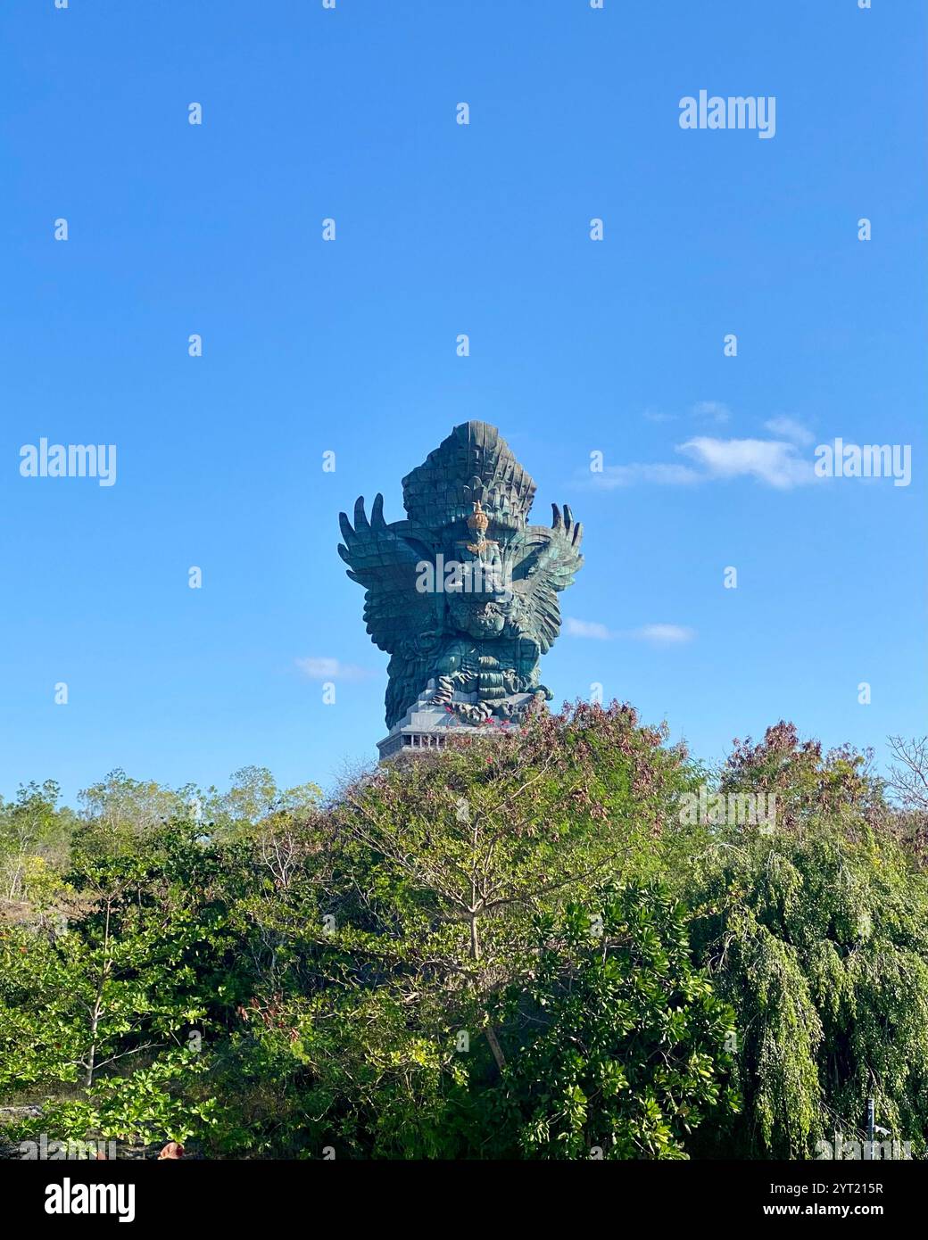 Majestic Garuda Wisnu Kencana GWK Statue Rising Above Greenery in Bali, Indonesia Stock Photo ...