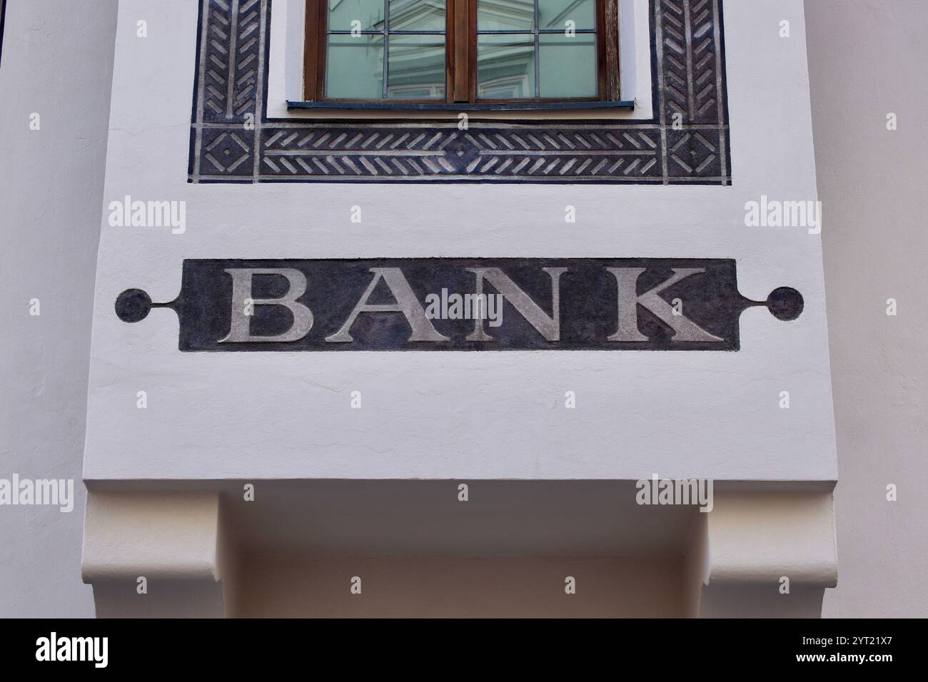 Traditional Bank Building Facade Sign with Ornate Stone Detailing in ...