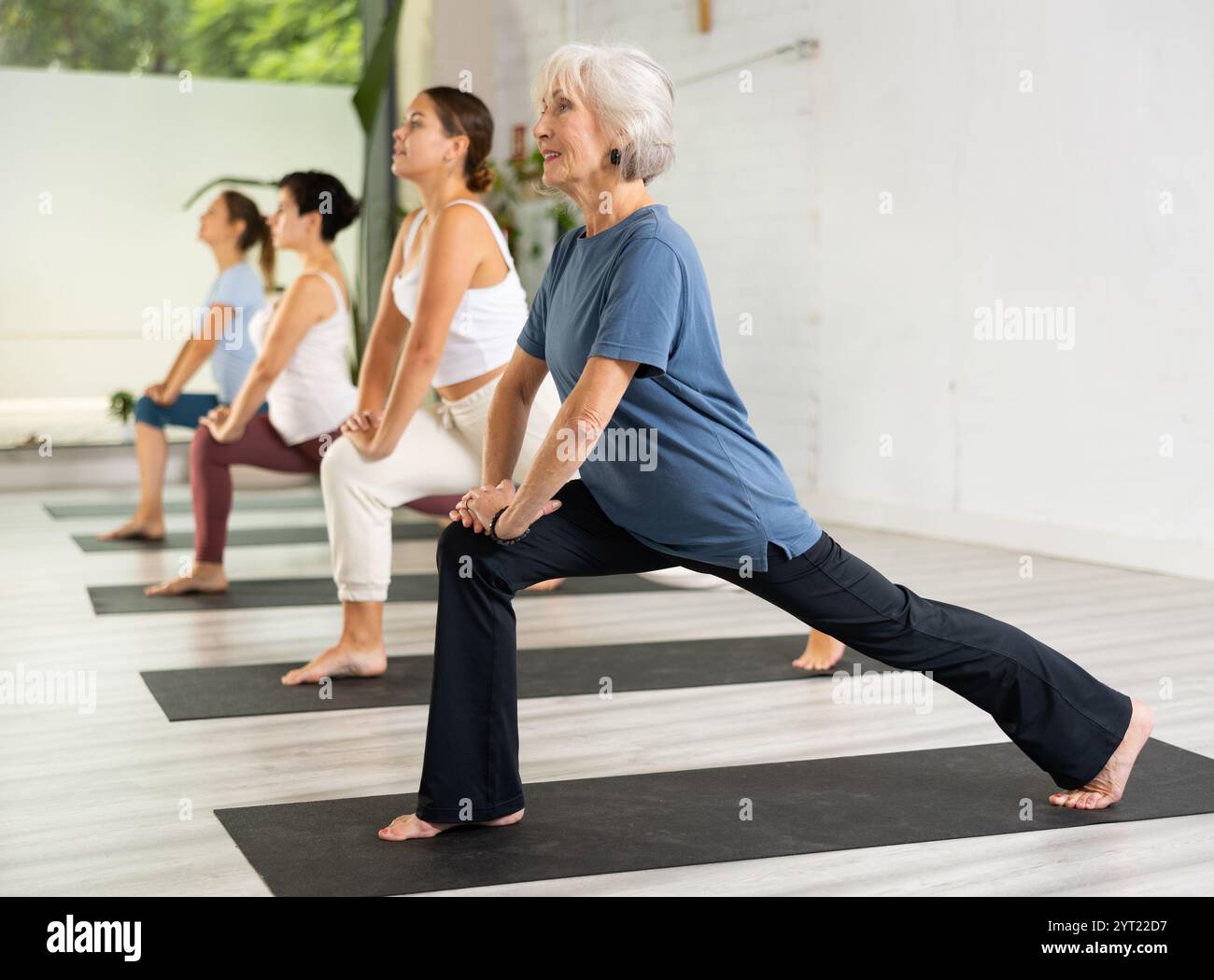 Mature woman lunge exercise hi-res stock photography and images - Alamy