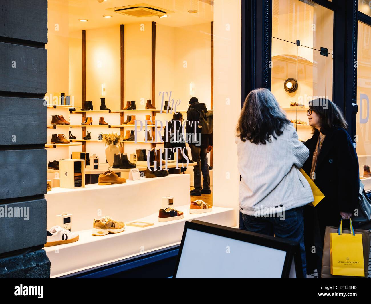 Strasbourg, France - Nov 29, 2024: Elegant shoe store window display ...