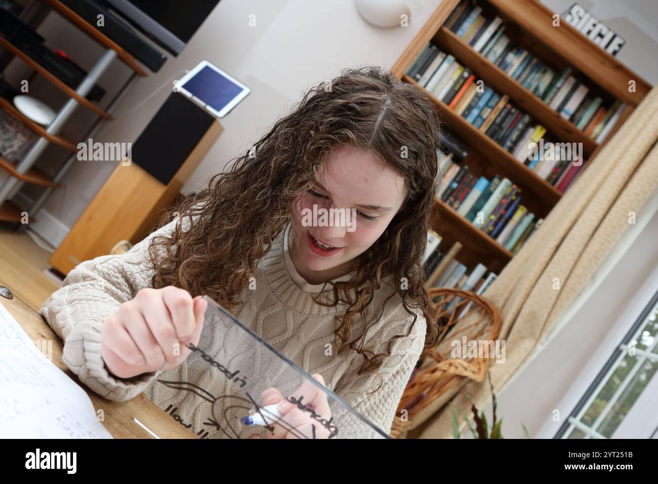 Teenager studying revising science biology cell structure GCSE drawing ...