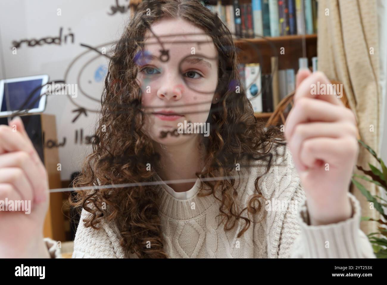 Teenager studying revising science biology cell structure GCSE drawing ...