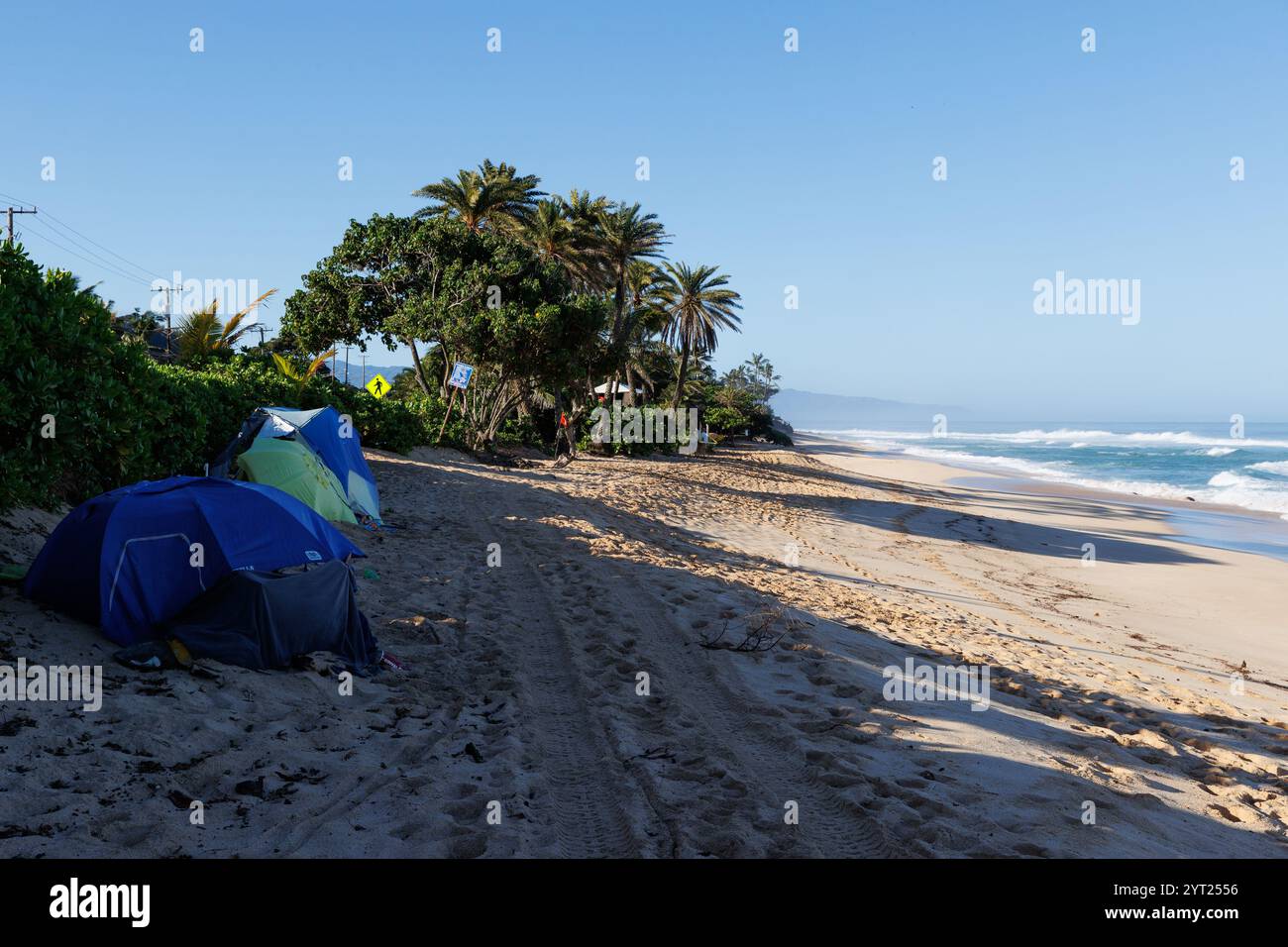 Dec 1 2024. Sunset Beach, HI. Homeless people living in tents at Sunset ...