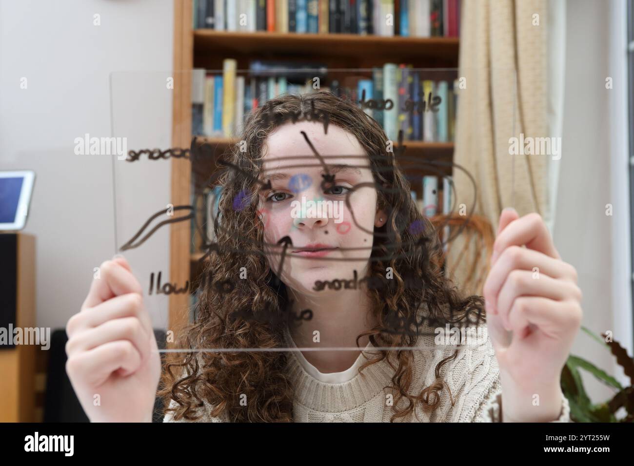 Teenager studying revising science biology cell structure GCSE drawing ...