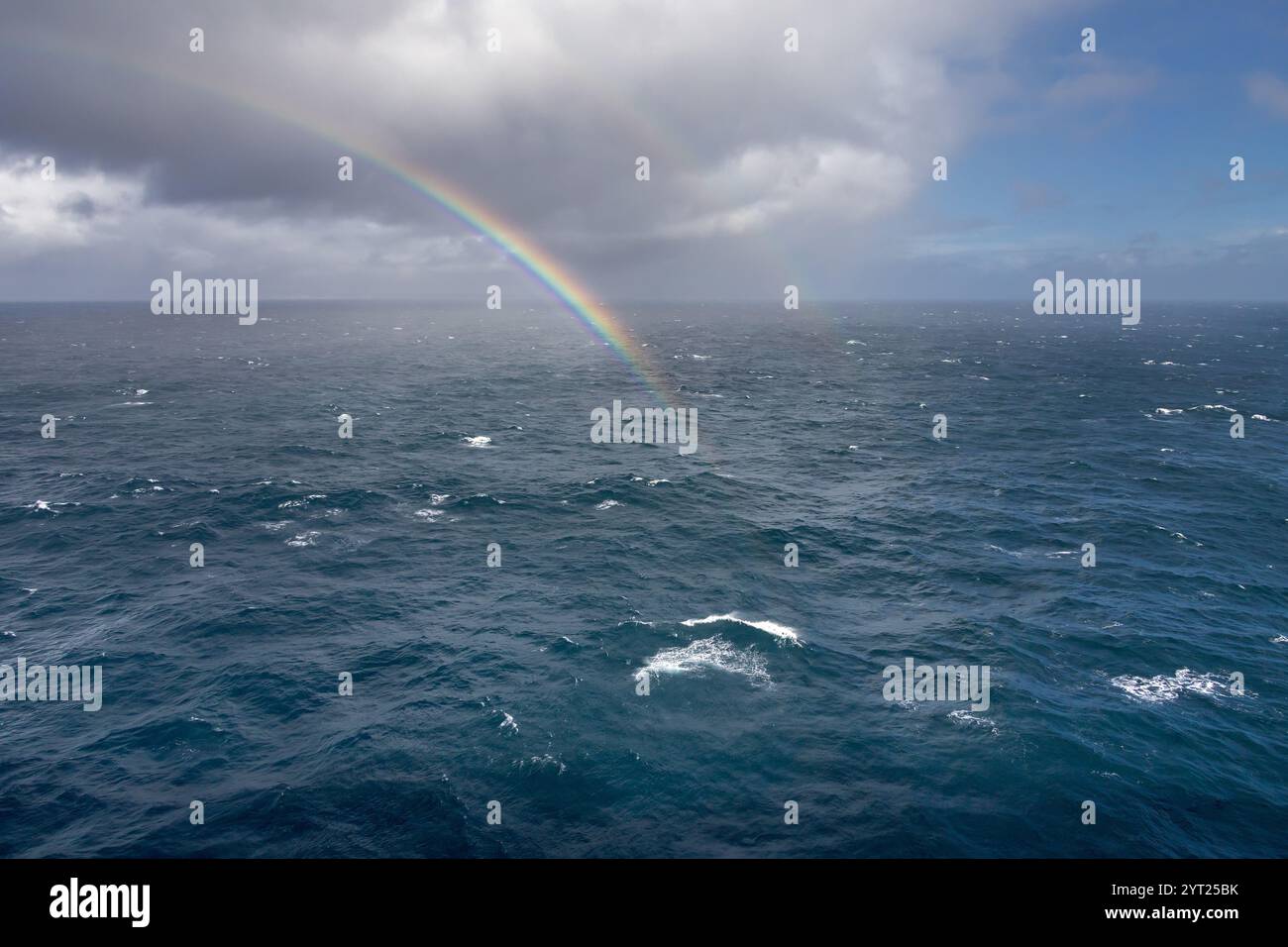 Double Rainbow In The Atlantic Ocean After A Brief Rain Storm Cloudy ...