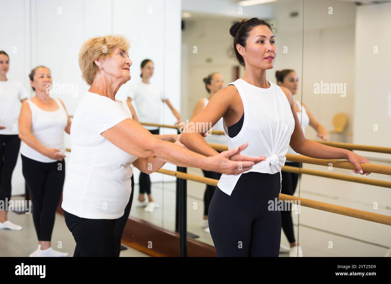Dancing Asian woman standing in a ballet stance, where the ...