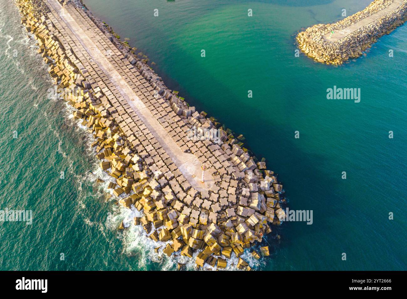 entrance barrier of a harbor, aerial view with drone. Background for ...