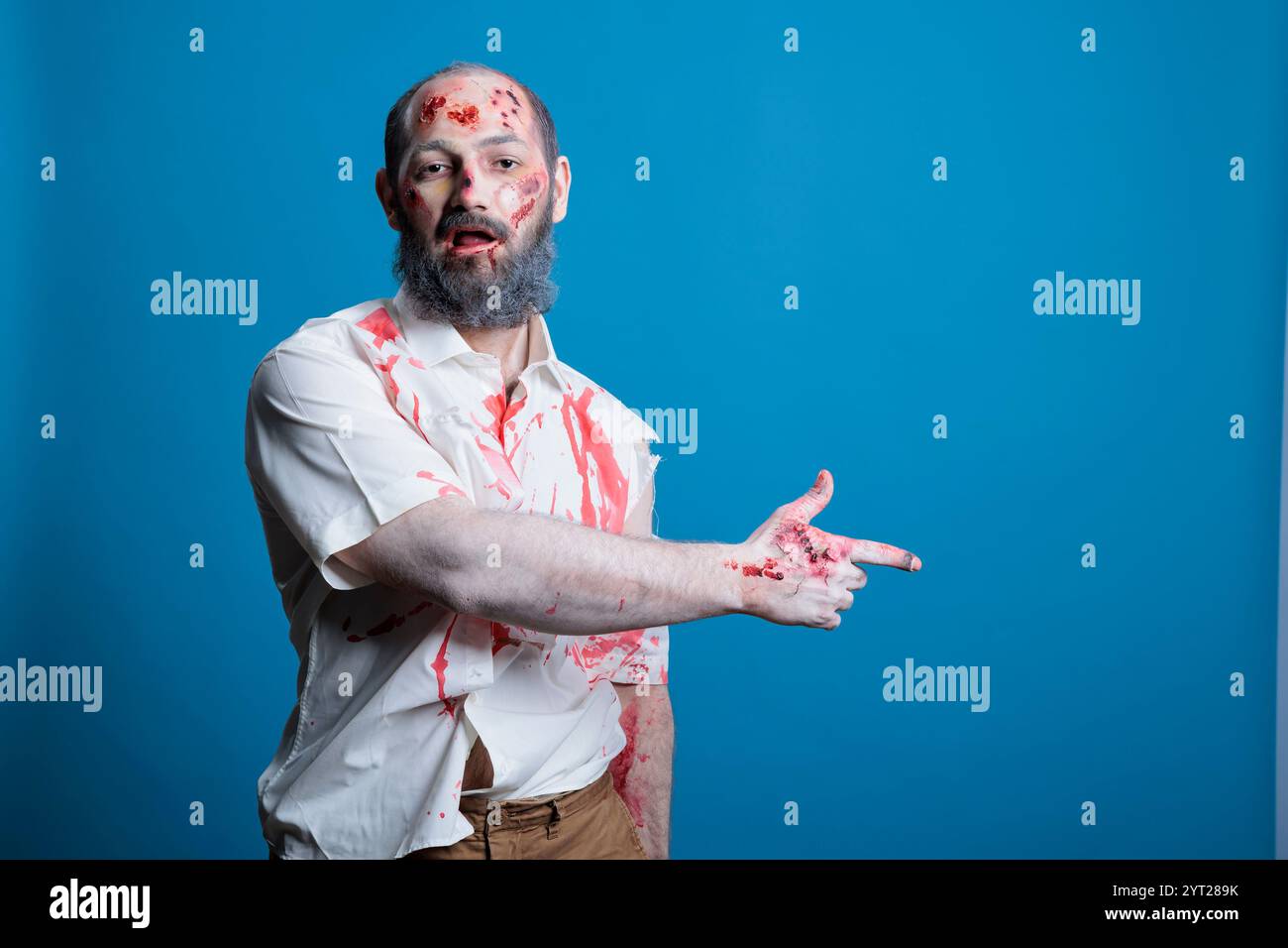 Portrait of zombie infected by virus showing empty copy space ...